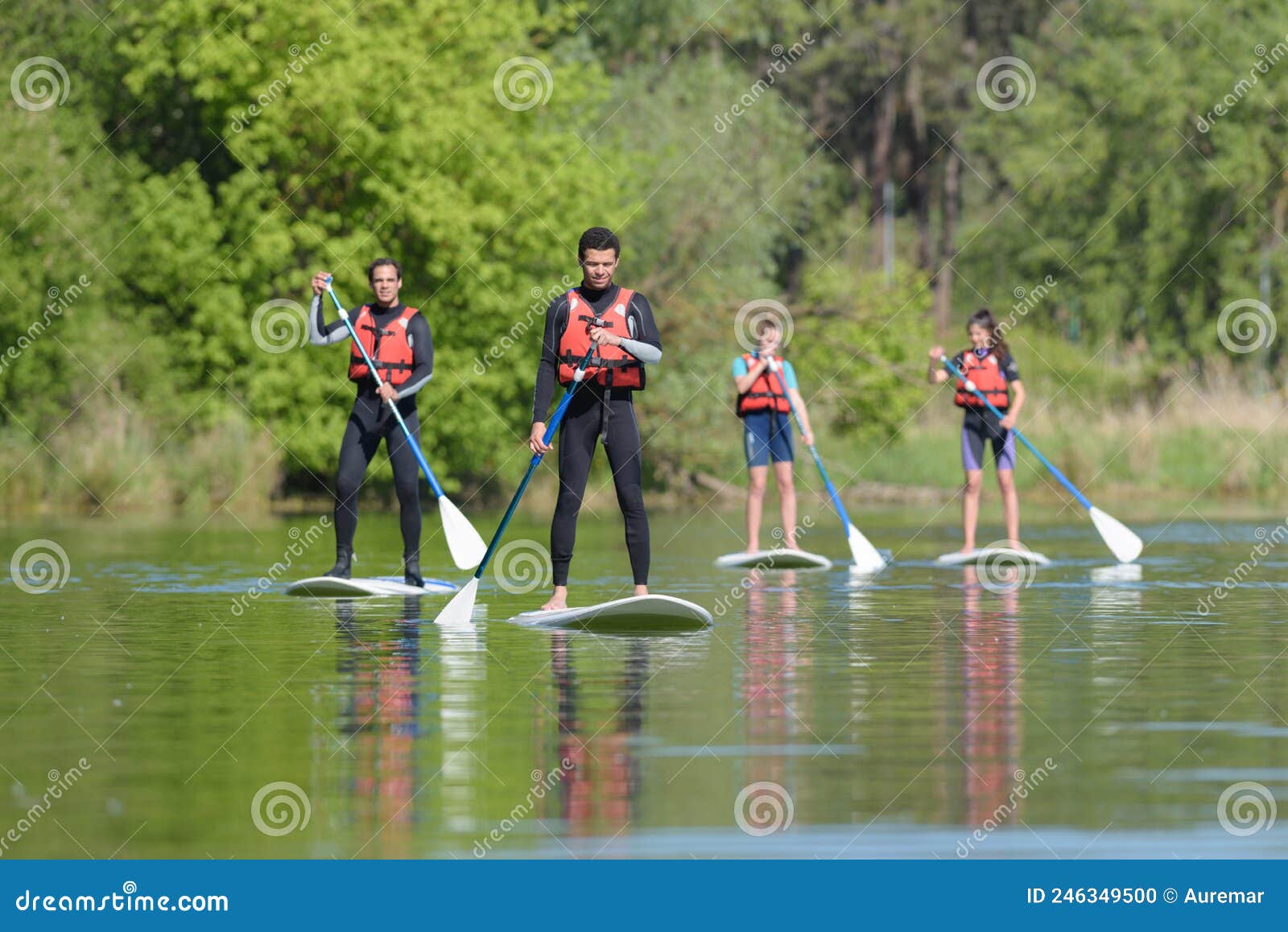 Stand Up Paddle Group on Sea Stock Photo - Image of ocean, stand: 246349500