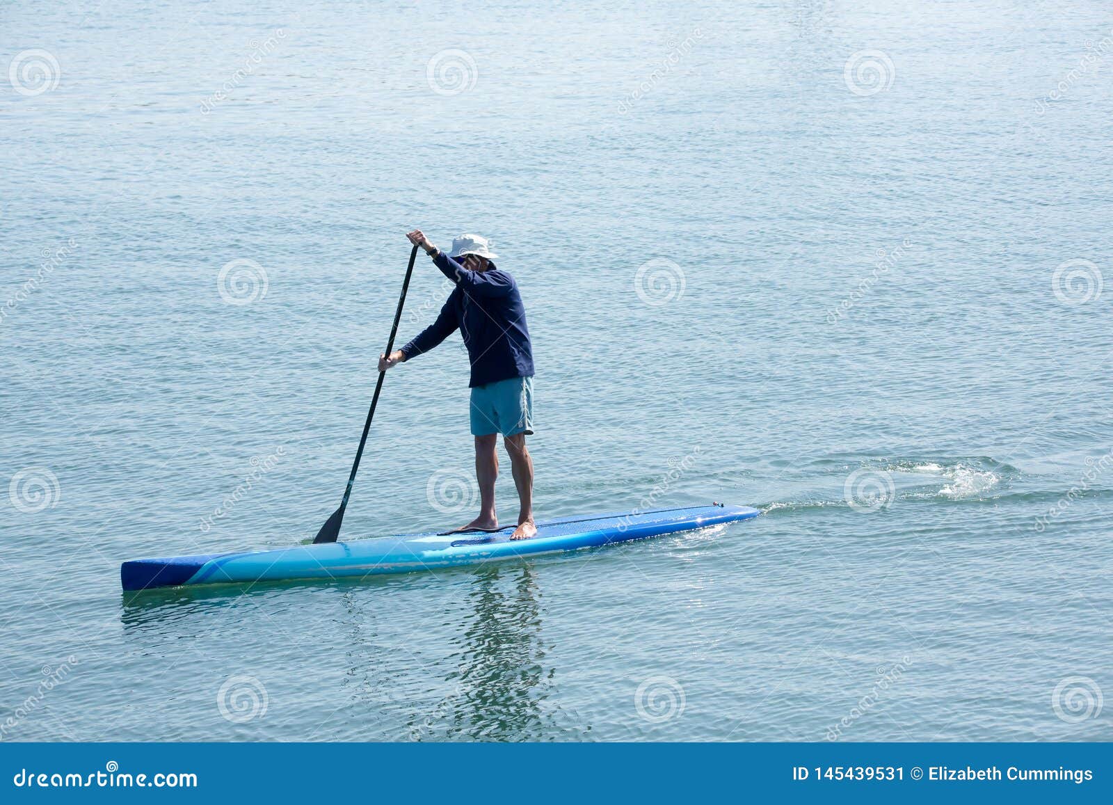 Stand Up Paddler SUP Recreation in the Bay Stock Image - Image of dock ...