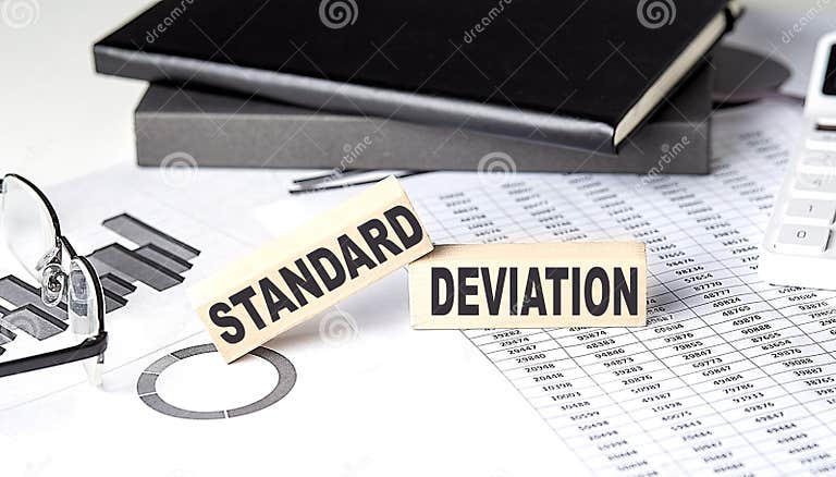 STANDARD DEVIATION - Text on a Wooden Block with Chart and Notebook ...