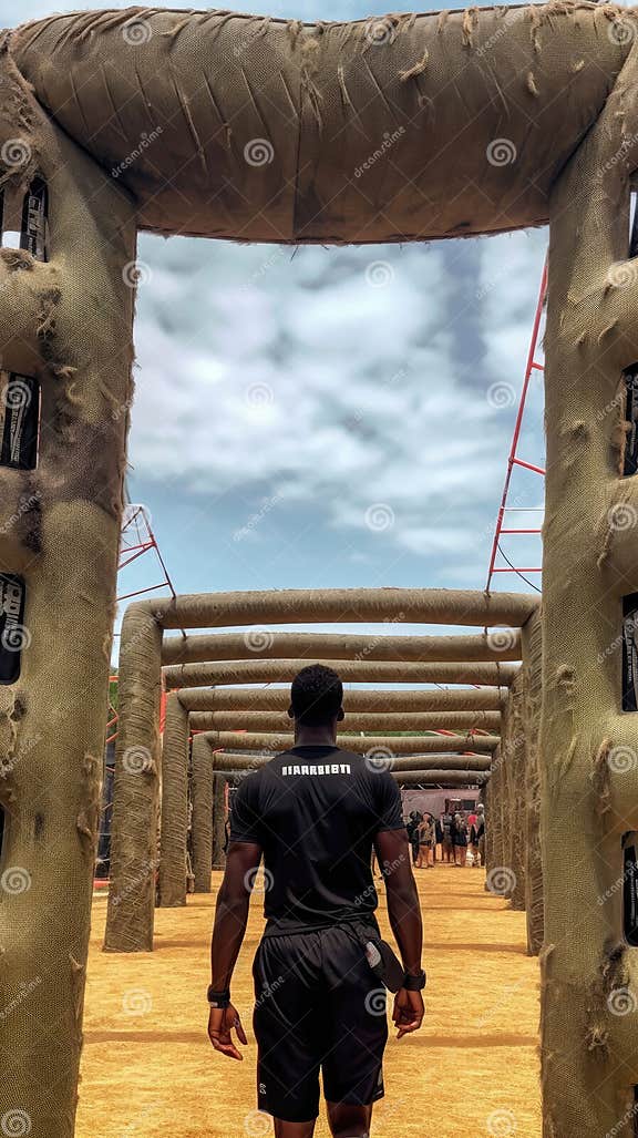 Standing Backwards the Athlete is Shown Out in Front of a Challenging ...