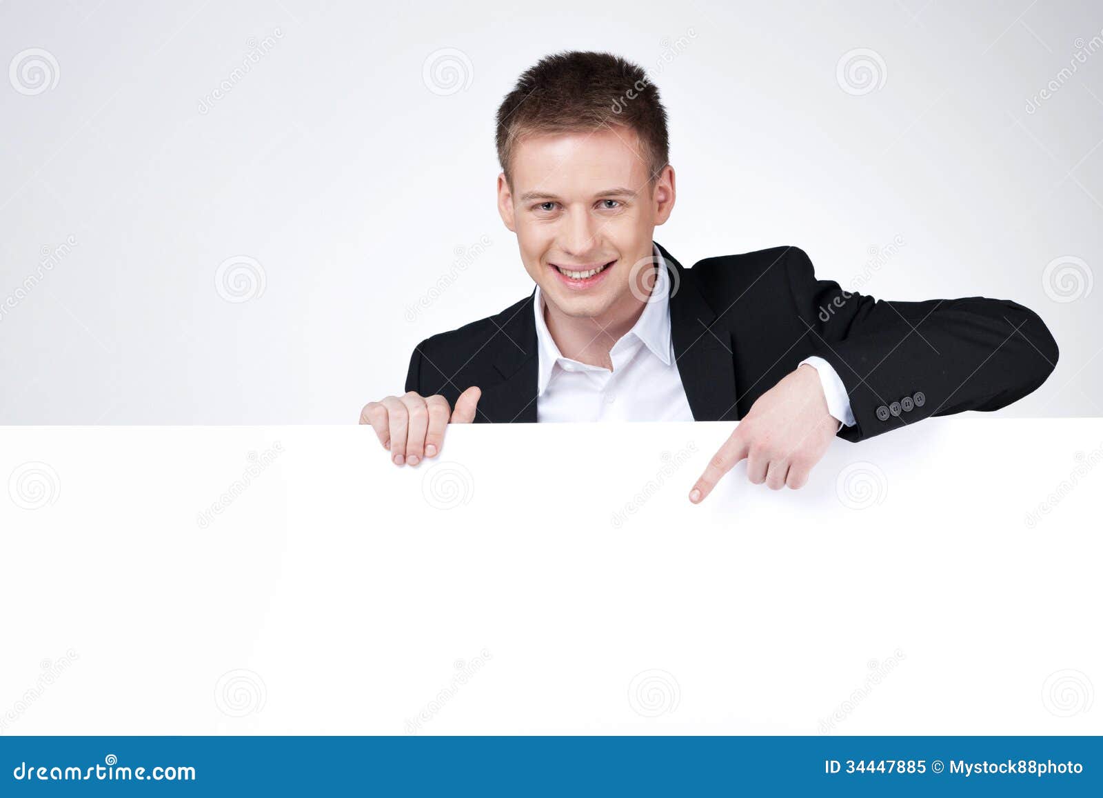 Standing behind the poster stock image. Image of pointing - 34447885