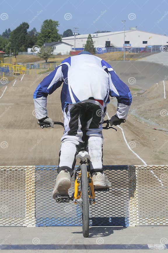 Standing BMX Biker stock photo. Image of ready, race - 26209528