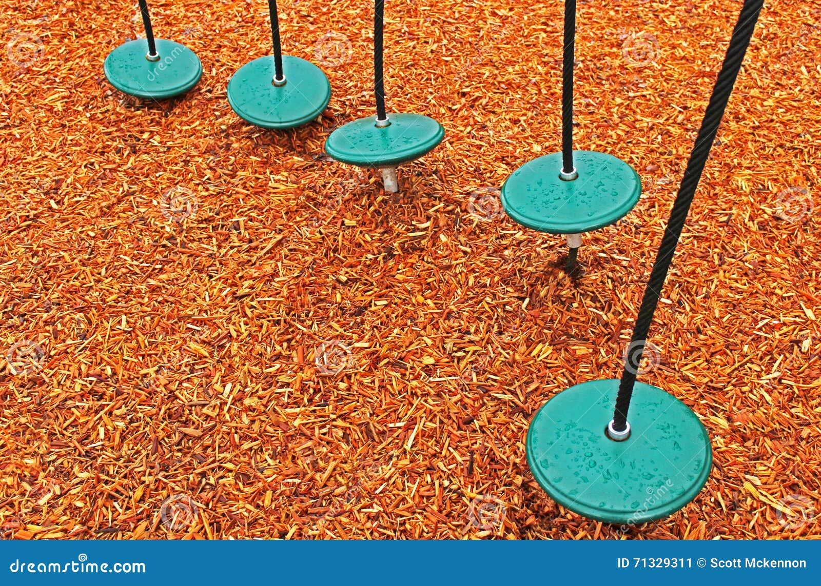 Standing Disks stock image. Image of green, wood, playground - 71329311