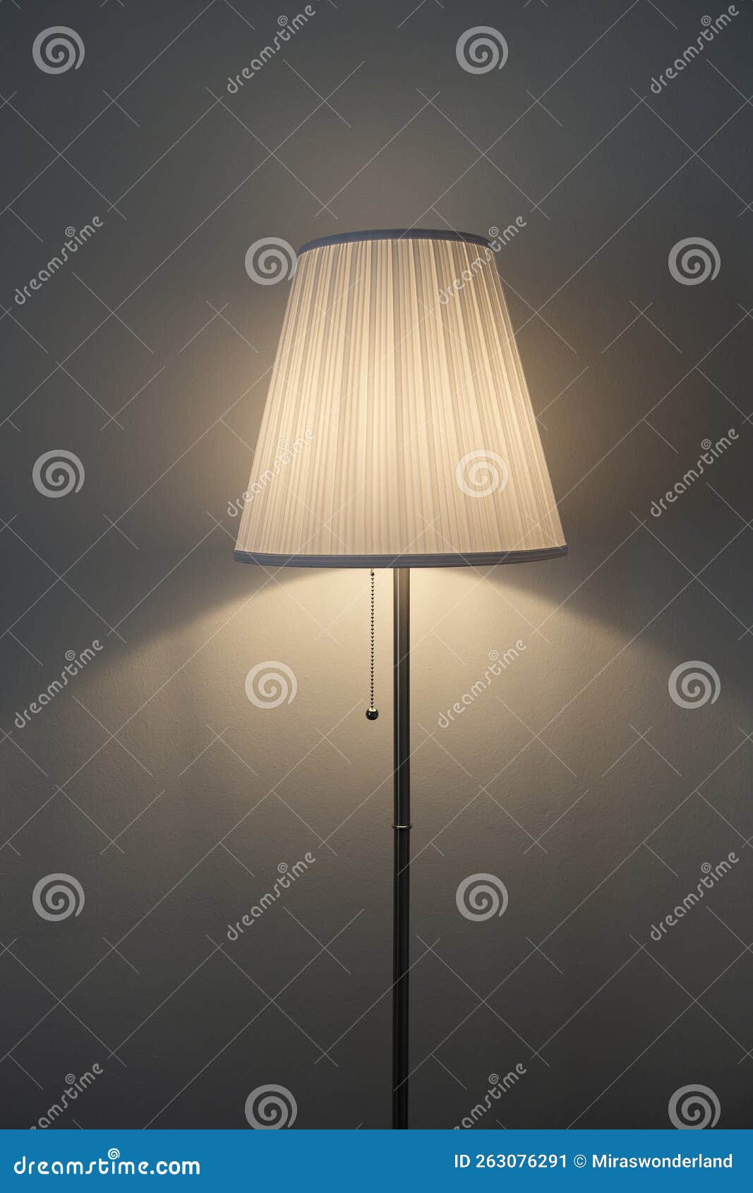 Standing Floor Table Lamp with Light Shining through the Lampshade ...