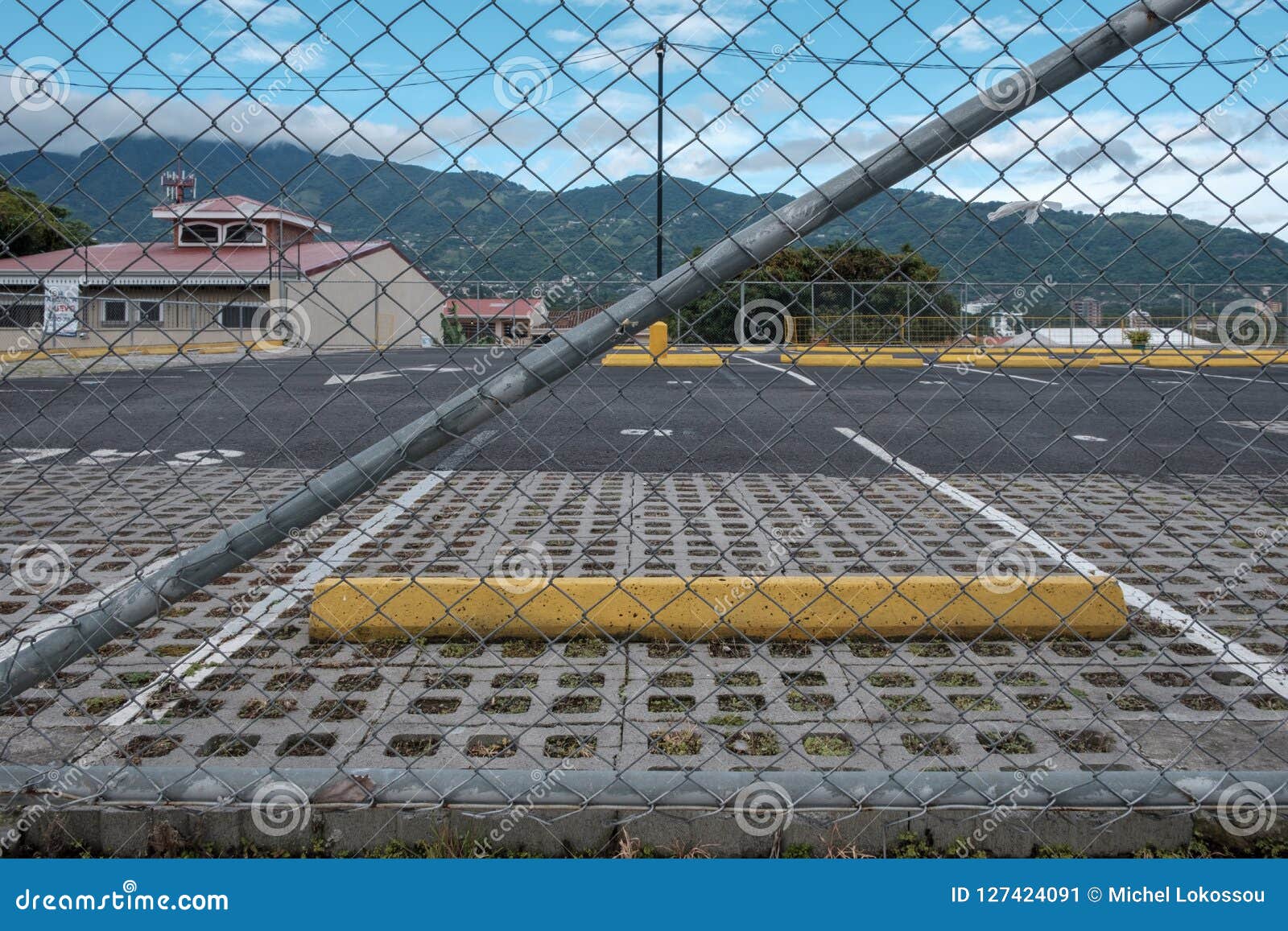 A Closed and Empty Parking Lot Stock Image - Image of city, landscape ...