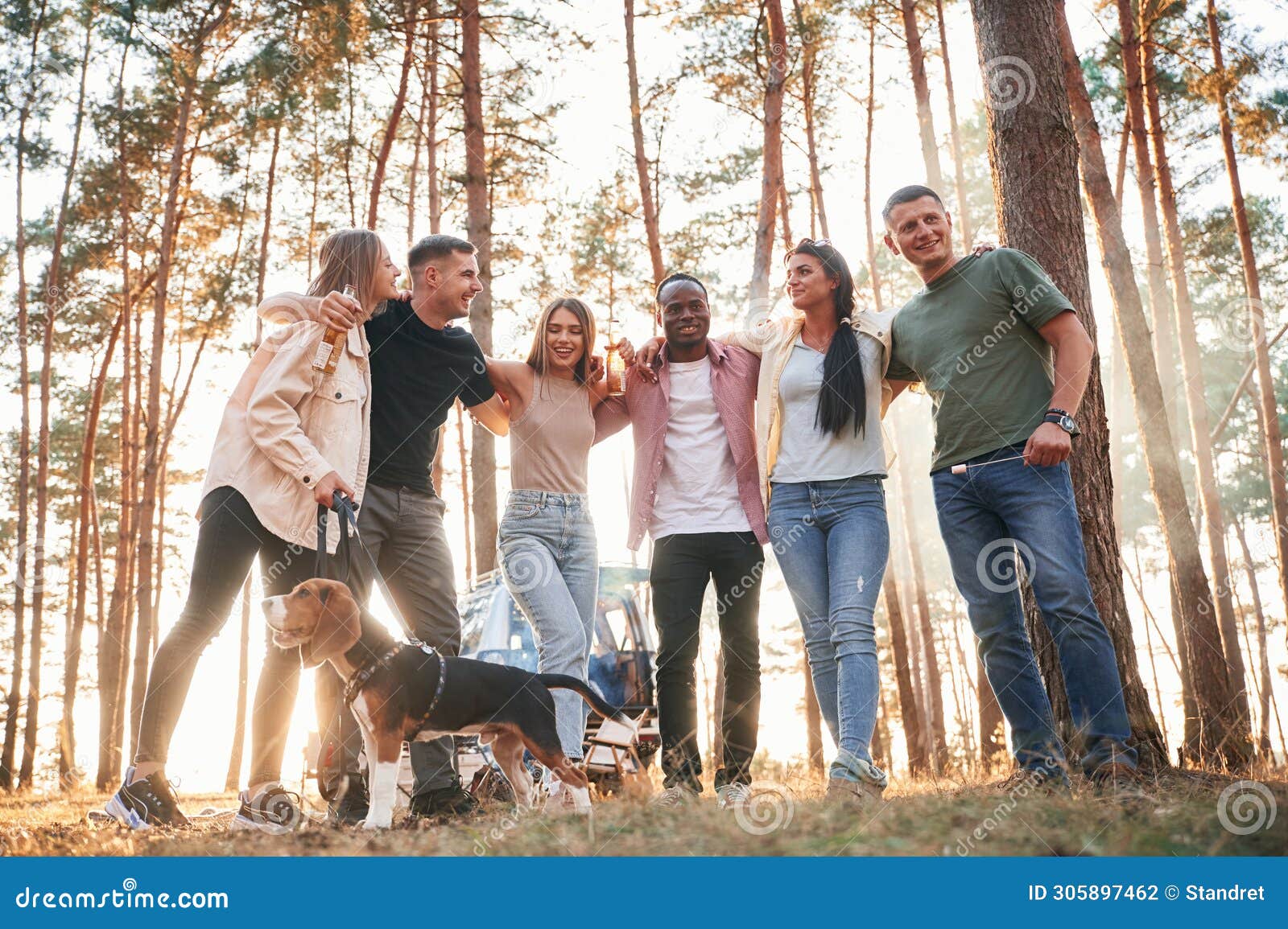 Standing, Fun with Dog. Group of Friends are Together in the Forest ...