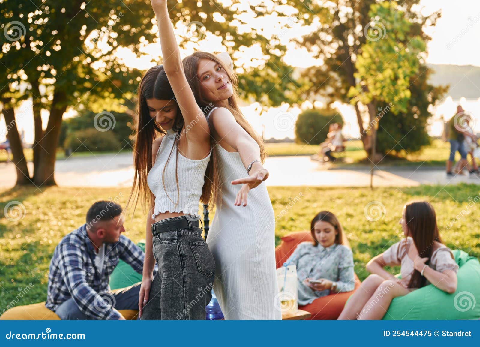 Standing and Having Fun. Group of Young People Have a Party in the Park ... Standing and Having Fun. Group of Young People Have a Party in the Park ...