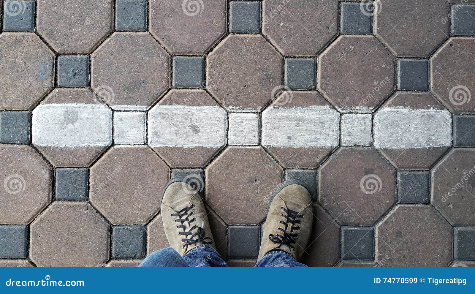 Standing Inside the White Lines on the Ground. Stock Image - Image of ...