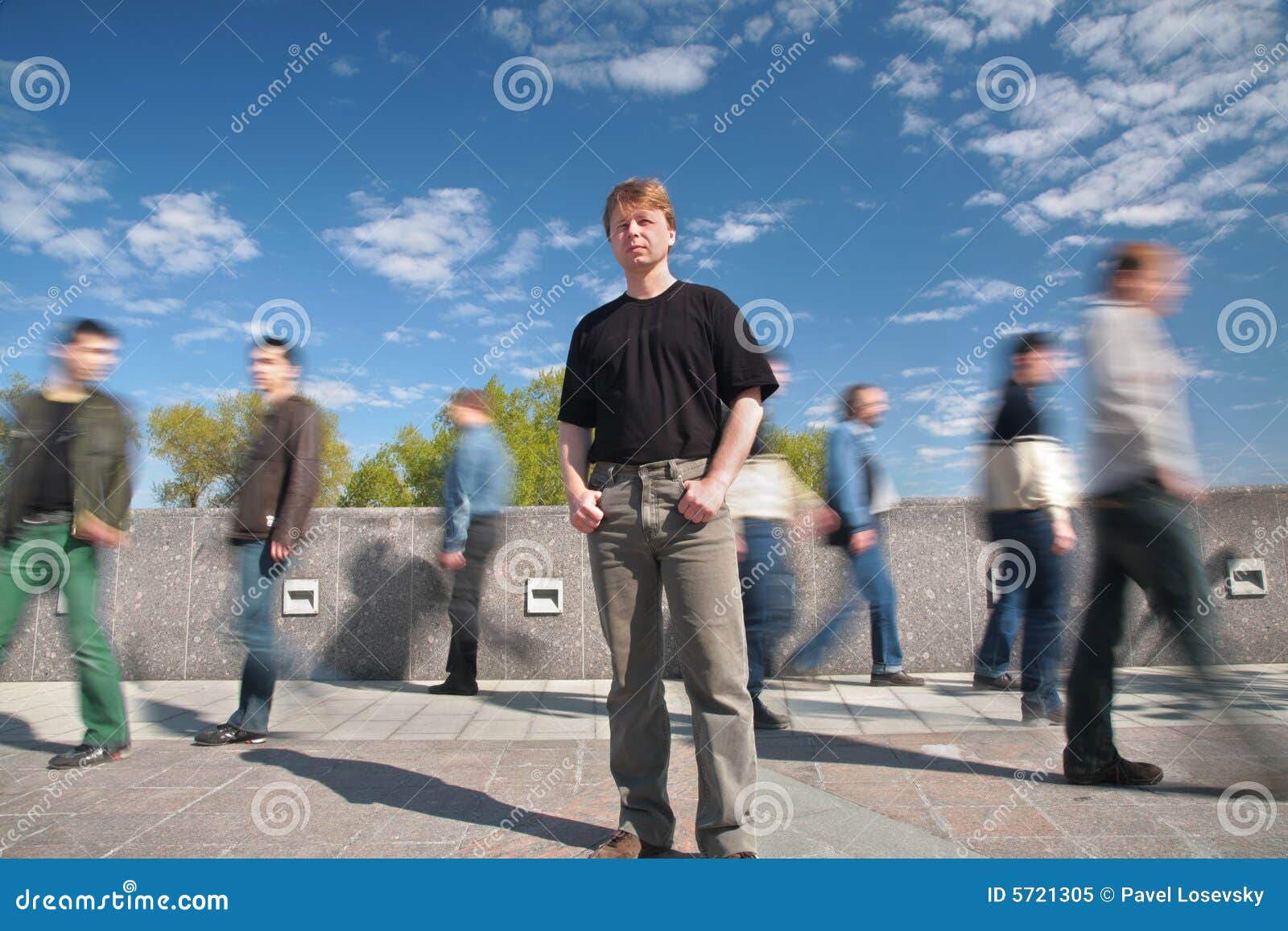 Standing Man among Moving Pedestrians Stock Image - Image of crowd ...