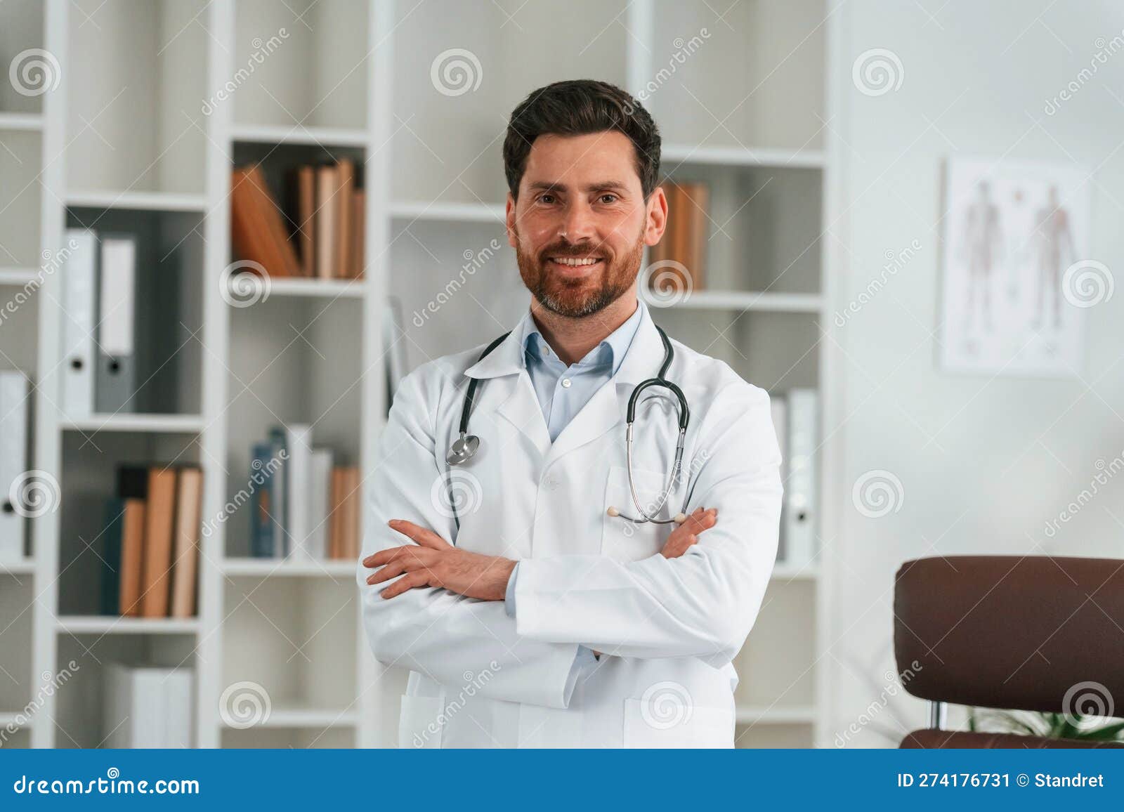 Standing in the Office. Doctor in Formal Clothes is Working in the ...