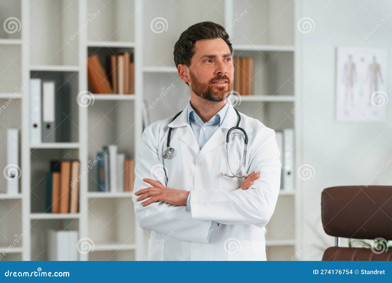 Standing in the Office. Doctor in Formal Clothes is Working in the ...