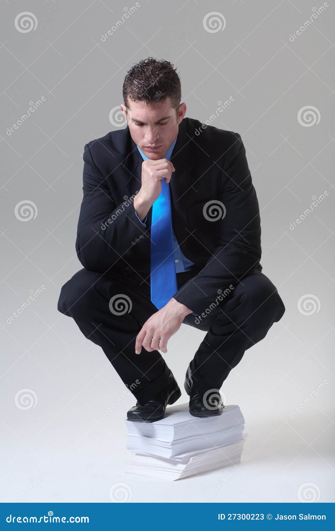 Standing on paper stock image. Image of male, material - 27300223