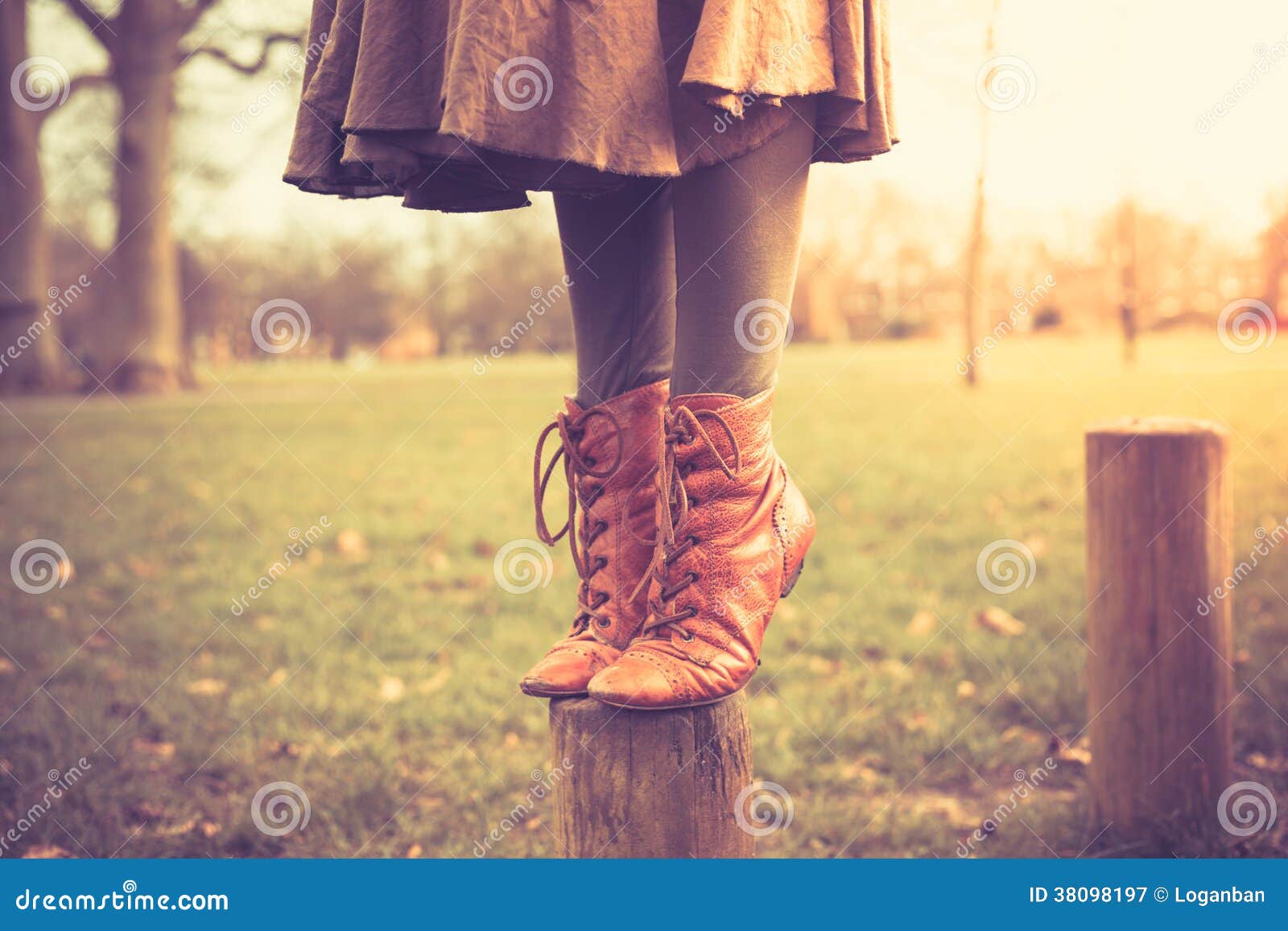 Standing on a post stock image. Image of styled, feet - 38098197