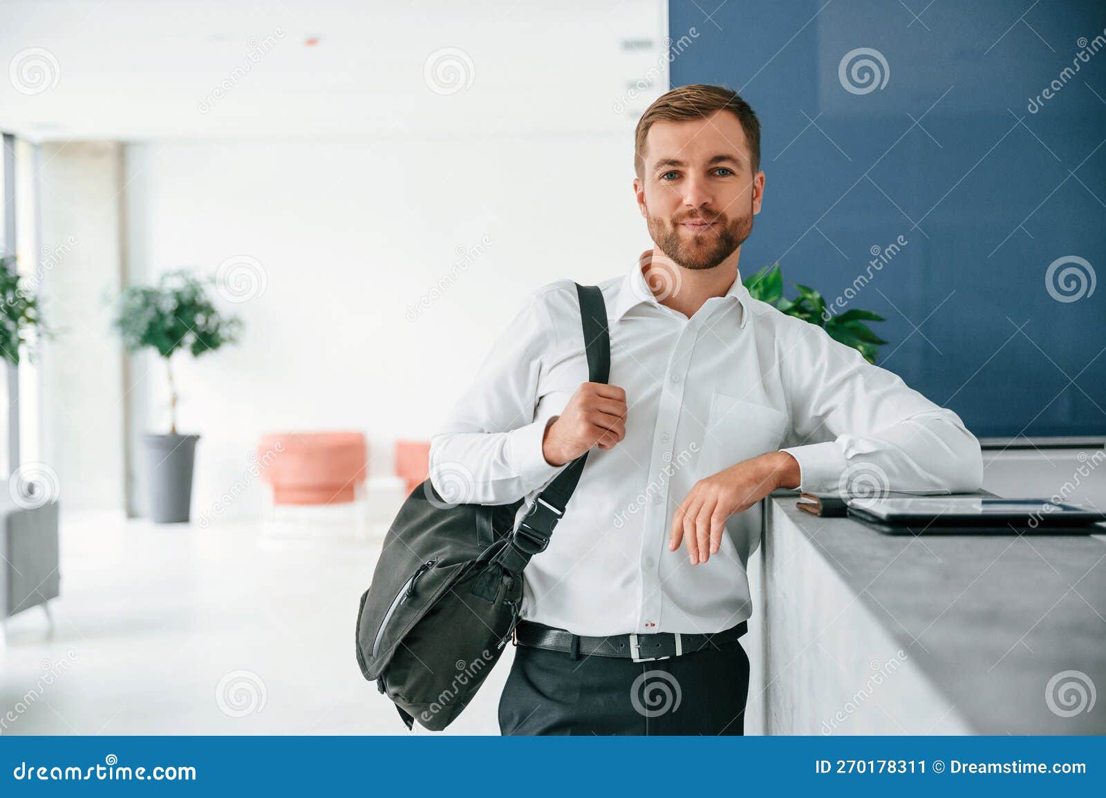 Standing at Reception. Elegant Man in Formal Clothes is Indoors Stock ...