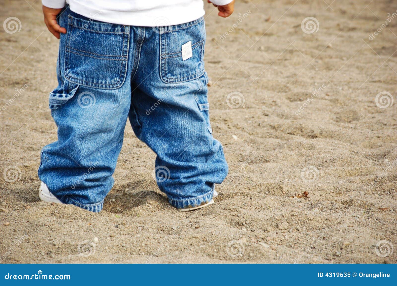 Standing in the sand stock image. Image of coastline, cute - 4319635