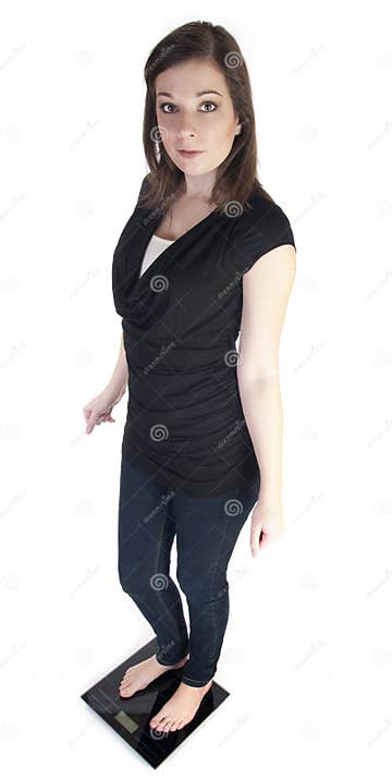 Standing on a scale stock image. Image of black, examining - 17968639