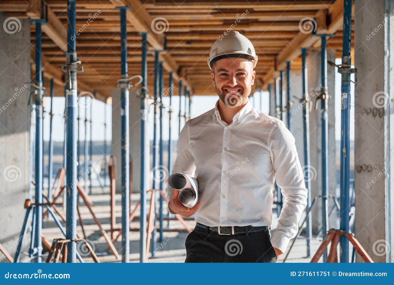 Standing and Smiling. Man is Working on the Construction Site at ...