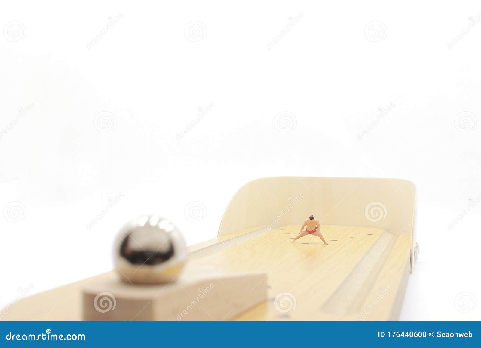 A Standing Sumo and Bowling on the Board Stock Photo - Image of play ...