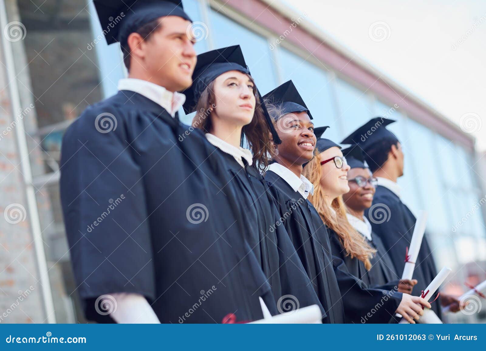 Standing Tall at Their Graduation. a Happy Group of Students Standing ...
