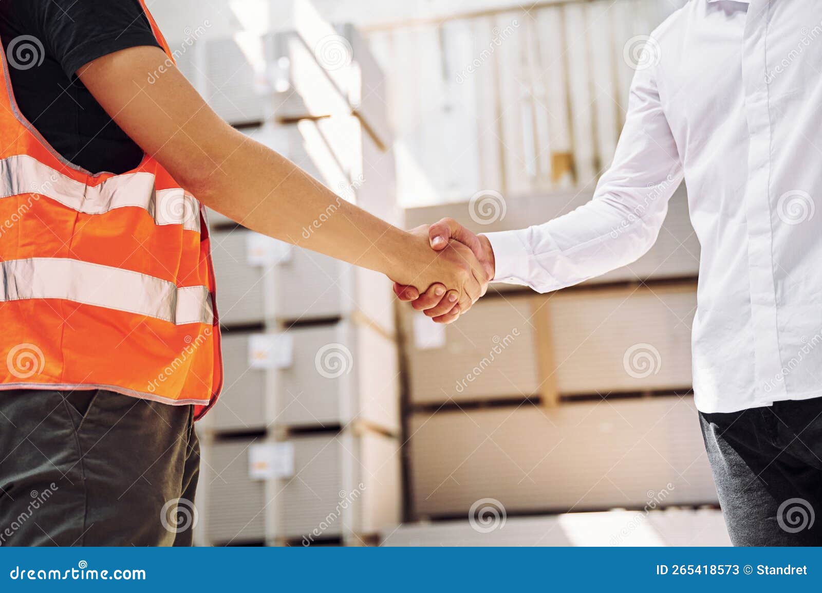 Standing Together. Two Storage Workers is in the Warehouse Stock Image ...
