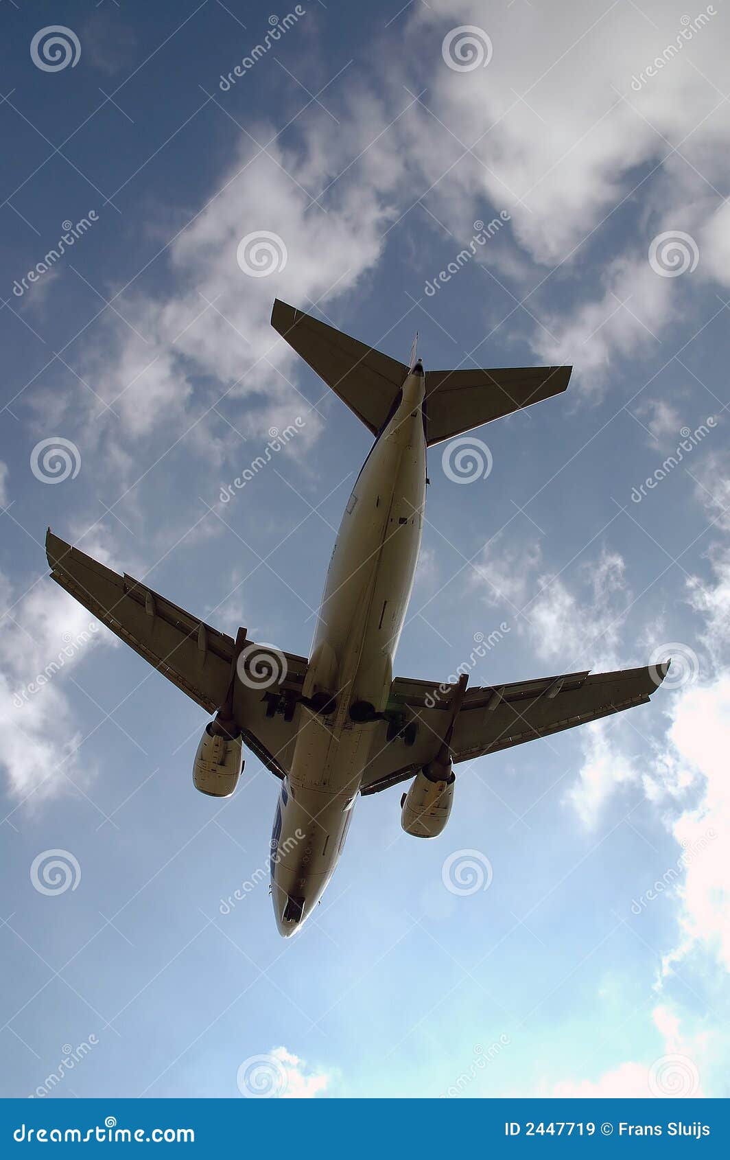 Standing Under a Flying Plane Stock Image - Image of landing, industrie ...