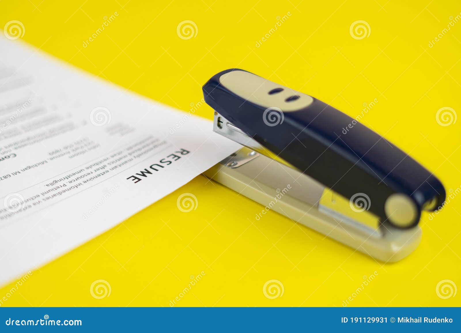 A Stapler and the Documents Files in Office on the Table, Staple the ...