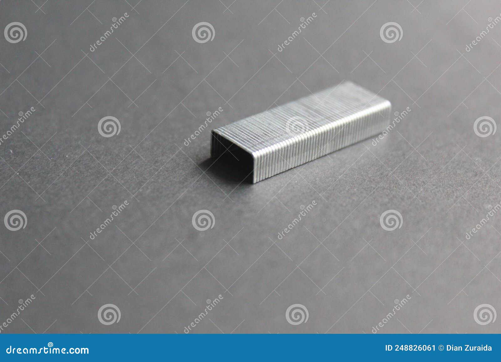 A Stapler Refill on a Black Background Stock Image - Image of isolated ...