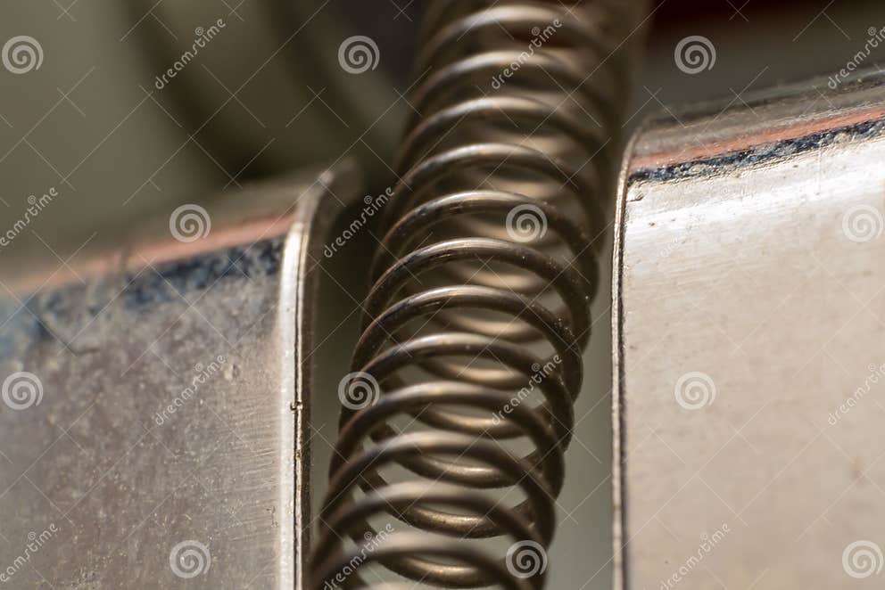 Stapler Spring Close-up and Blurred Background Stock Image - Image of ...