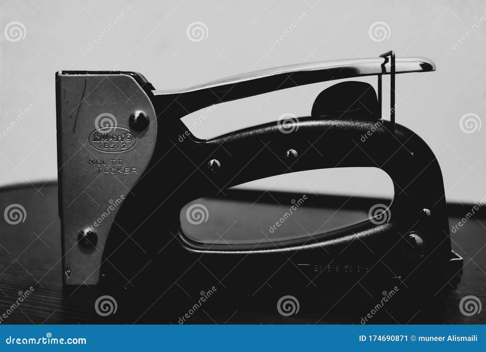 Stapler on table editorial photo. Image of table, work - 174690871