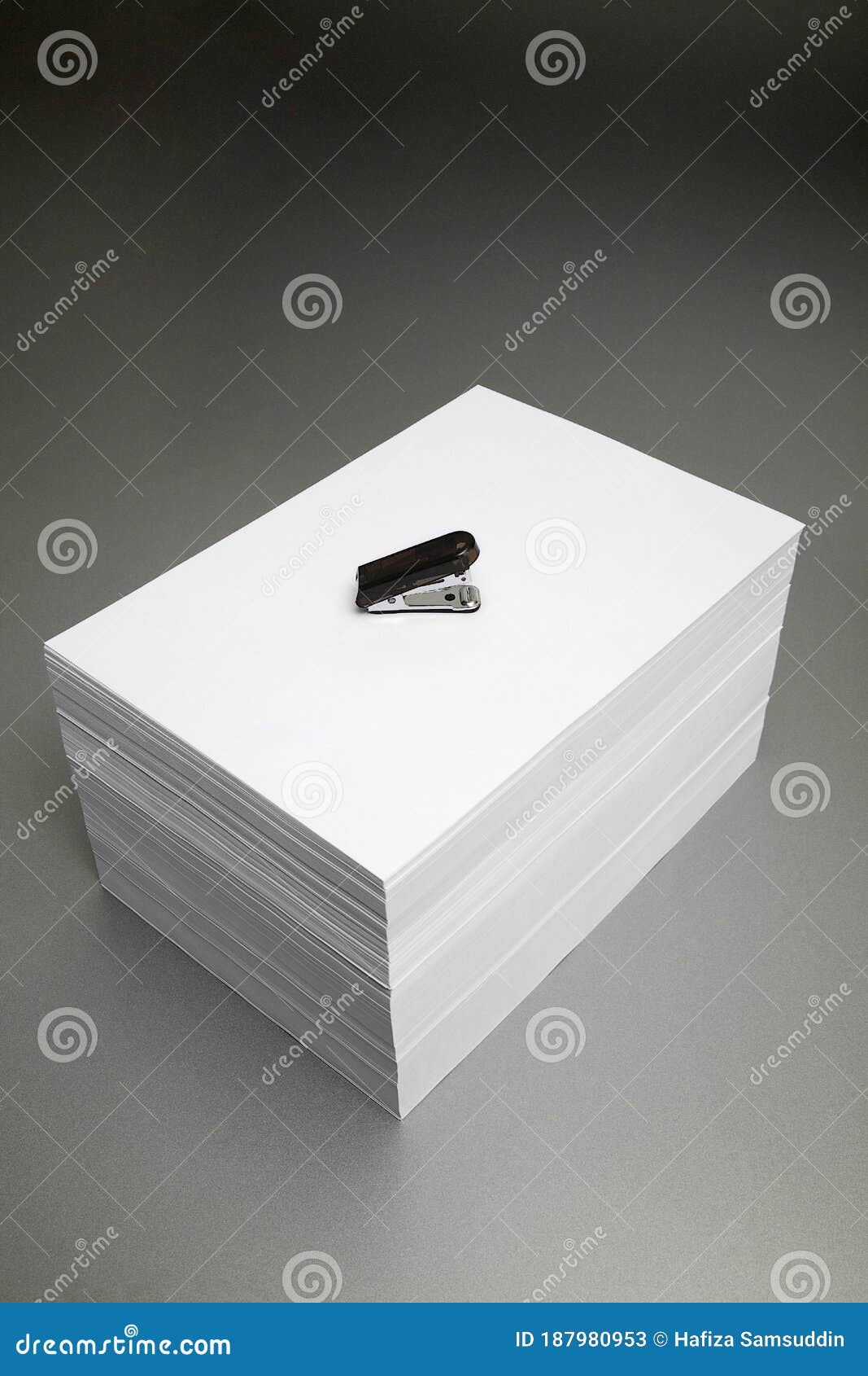 Stapler on Top of a Stack of Paper. Conceptual Image Stock Image ...