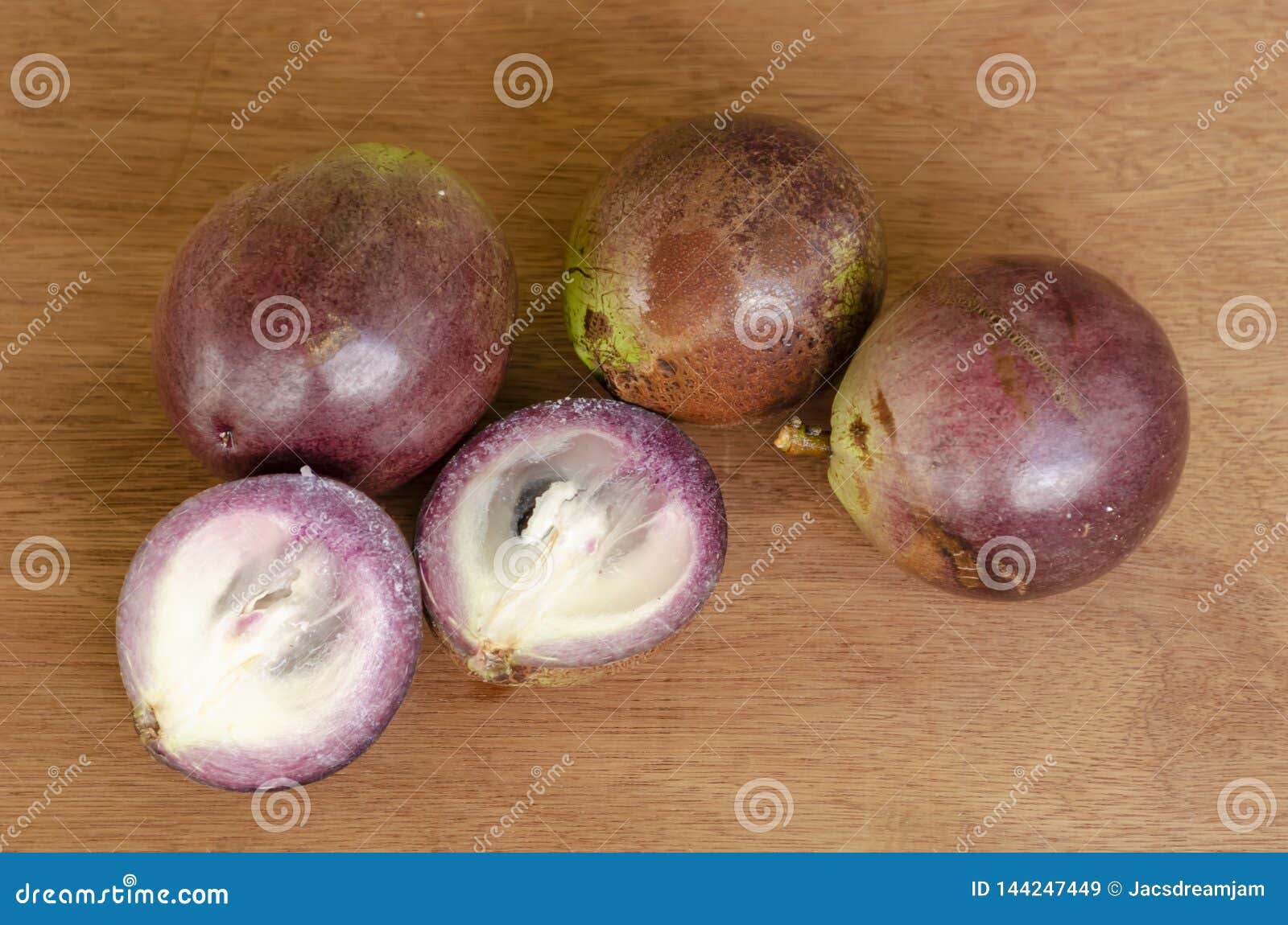 Star Apple Fruits on Board Surface Stock Image - Image of apple ...