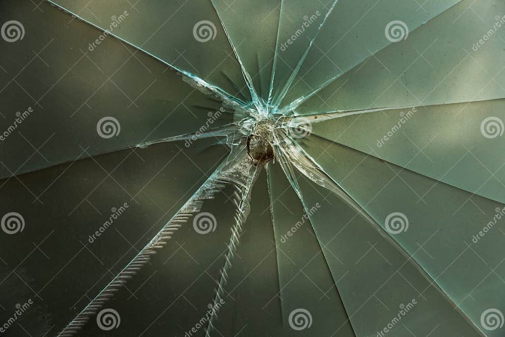 Star Blast Cracks in the Glass Panel. Broken Glass Texture Stock Image ...