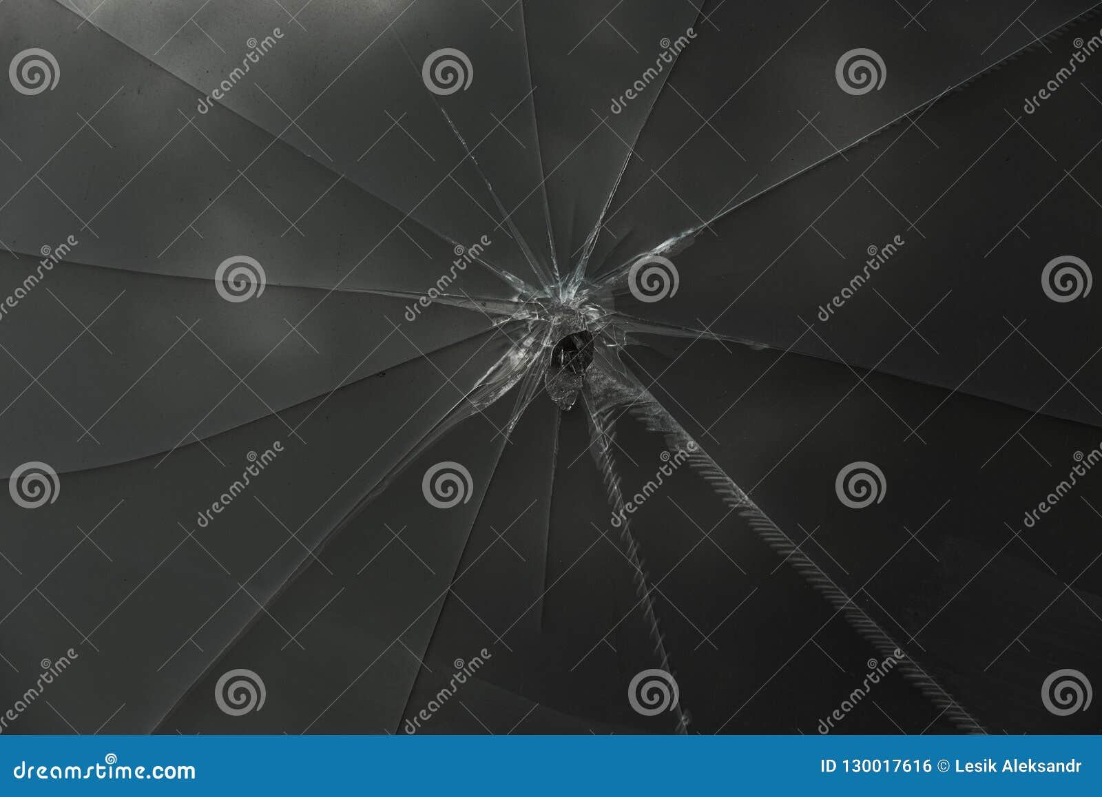 Star Blast Cracks in the Glass Panel. Broken Glass Texture Stock Photo ...