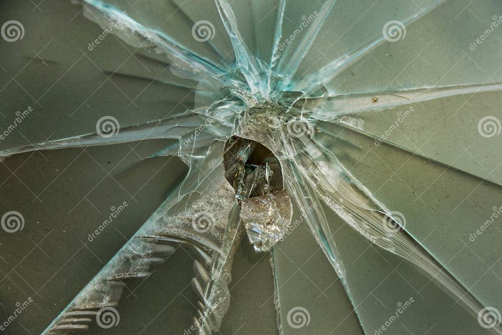 Star Blast Cracks in the Glass Panel. Broken Glass Texture Stock Image ...