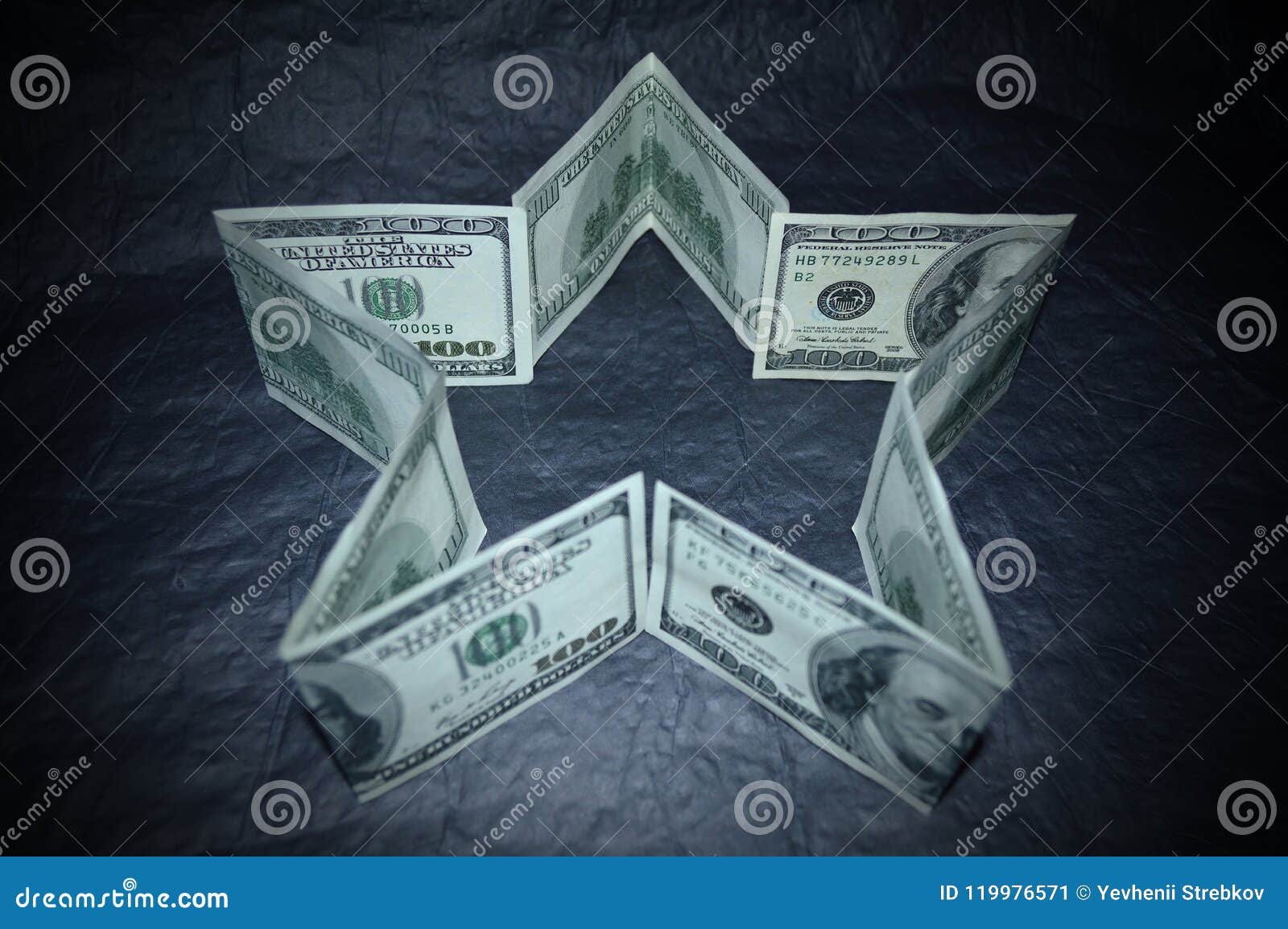 A star of 100 dollar bills stock image. Image of financial - 119976571