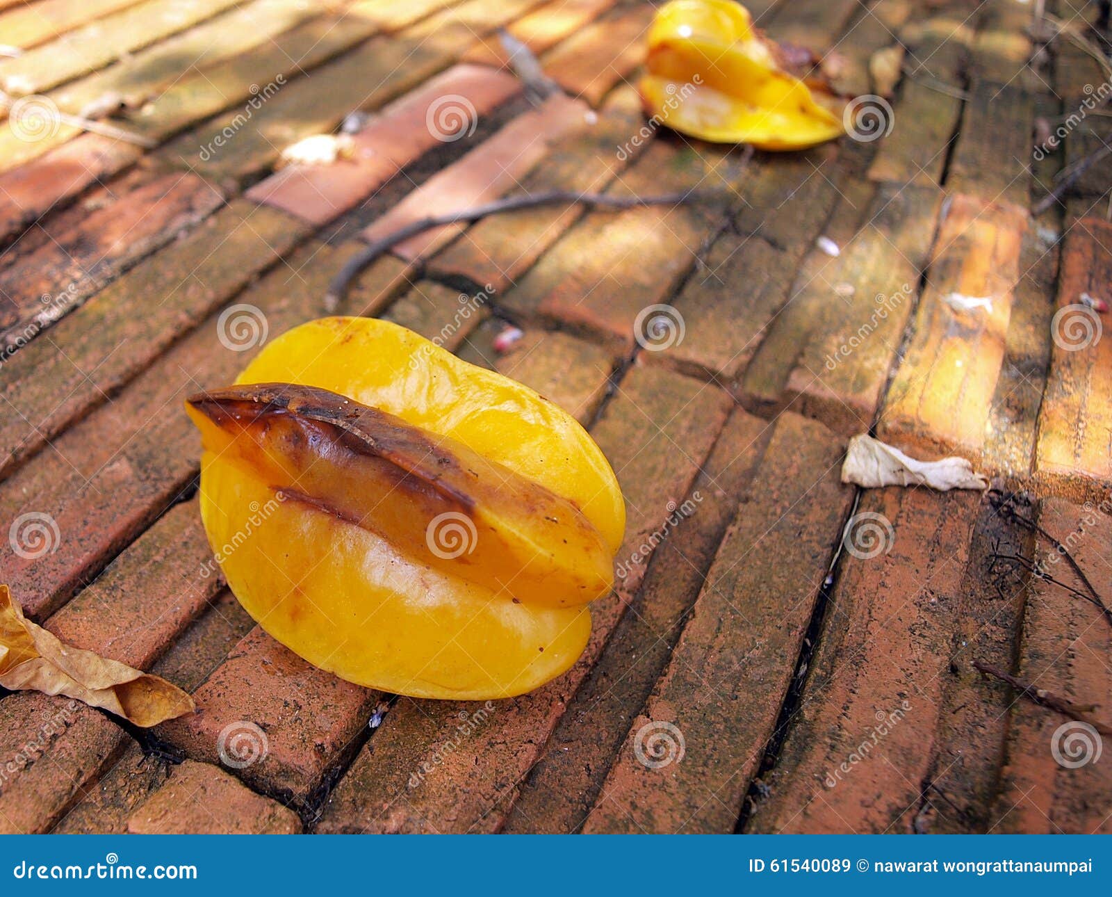 Star fruit on brick stock image. Image of gooseberry - 61540089