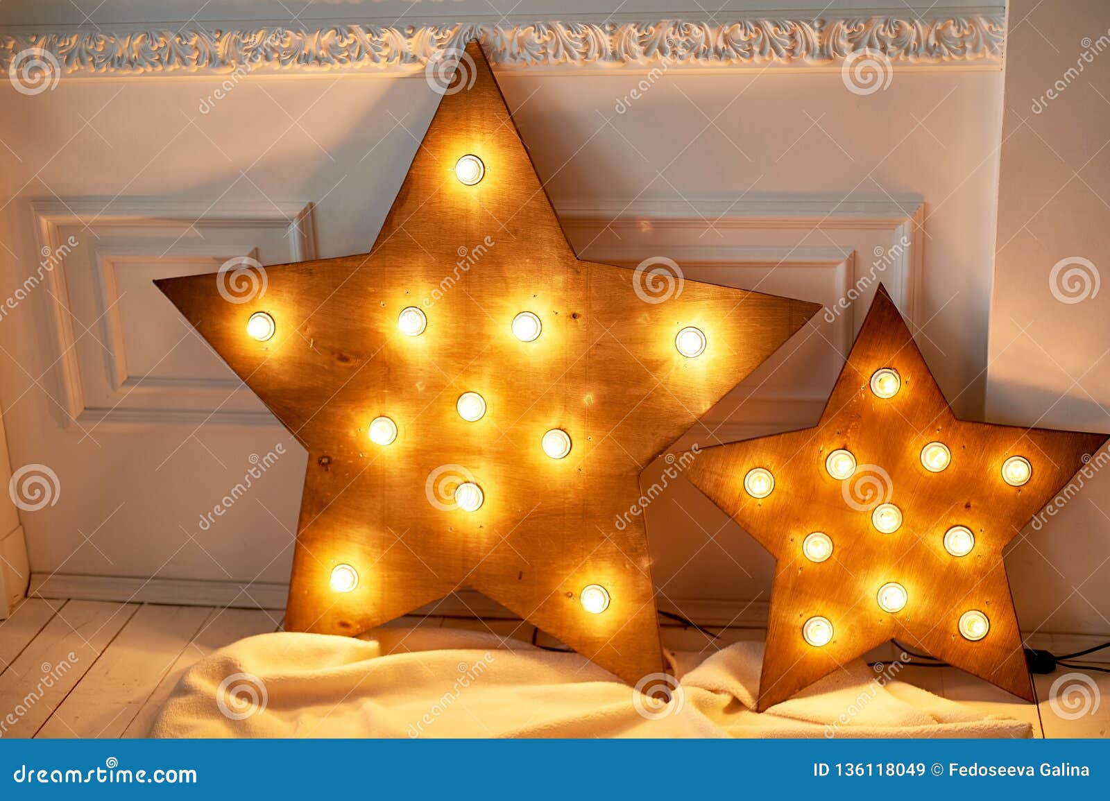 Star Lamp with Warm Light Bulbs in Bright Classic Room. Stock Image ...