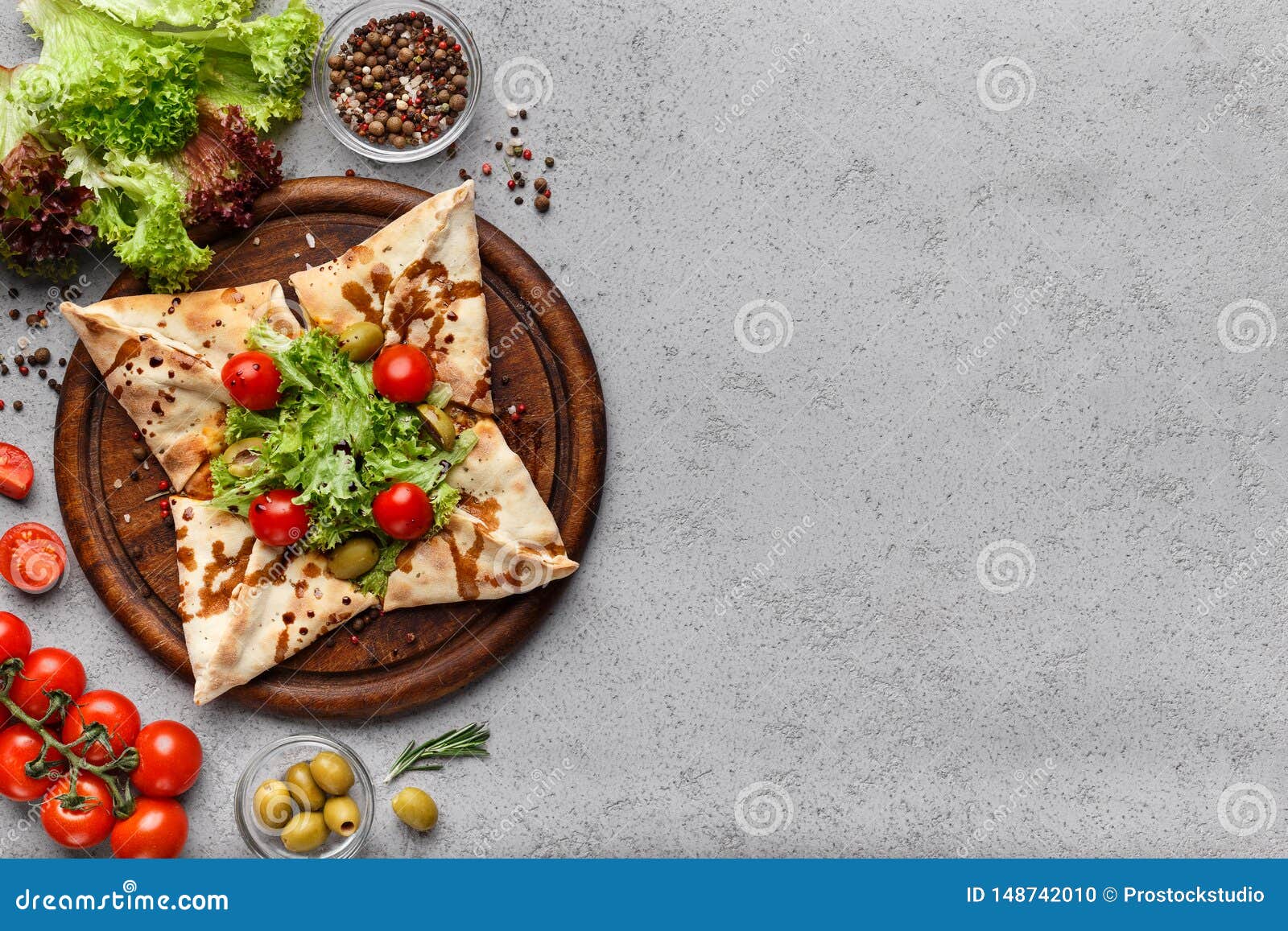 Star Shaped Pizza Decorated with Lettuce and Cherry Tomatoes Stock ...