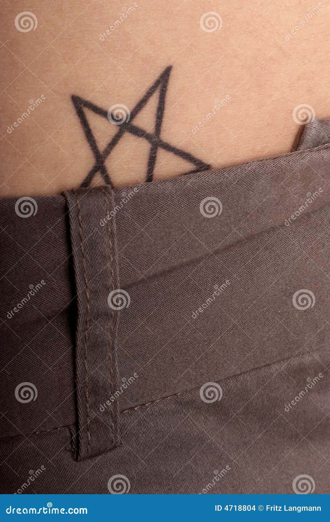 Star tattoo stock photo. Image of jewellery, brown, crossed - 4718804