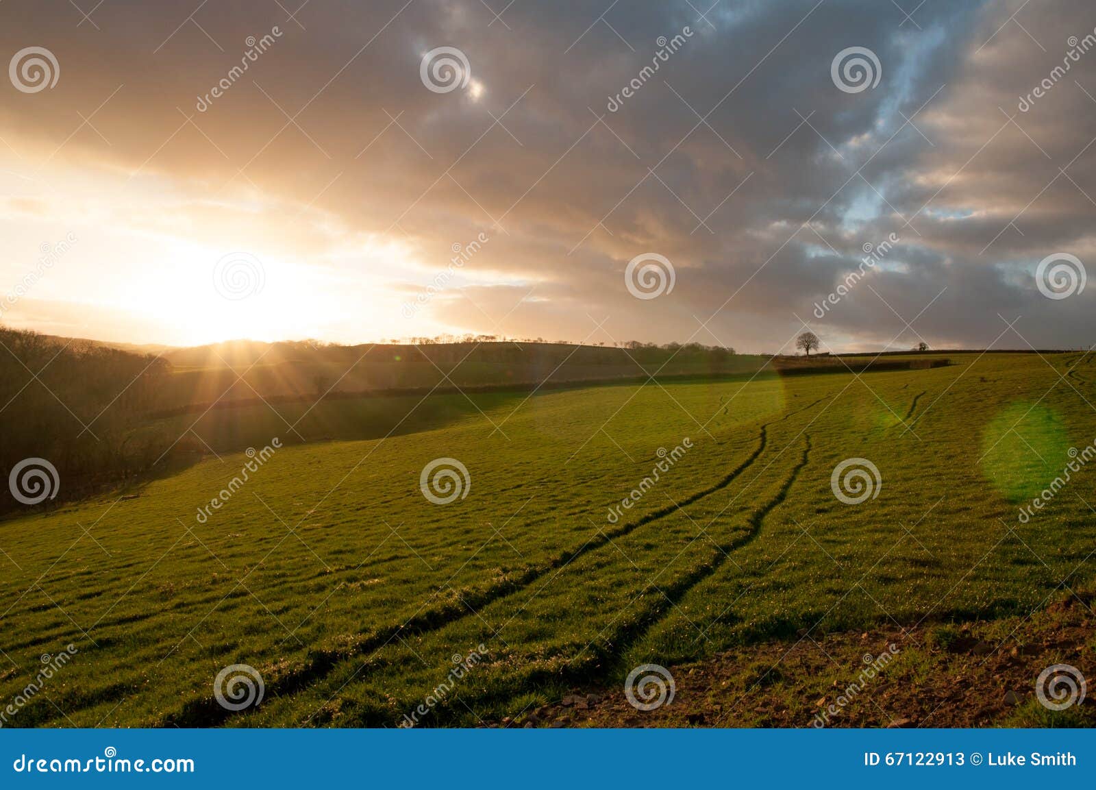 Starburst Sunset with Lens Flare Over Devon Fields Stock Image - Image ...