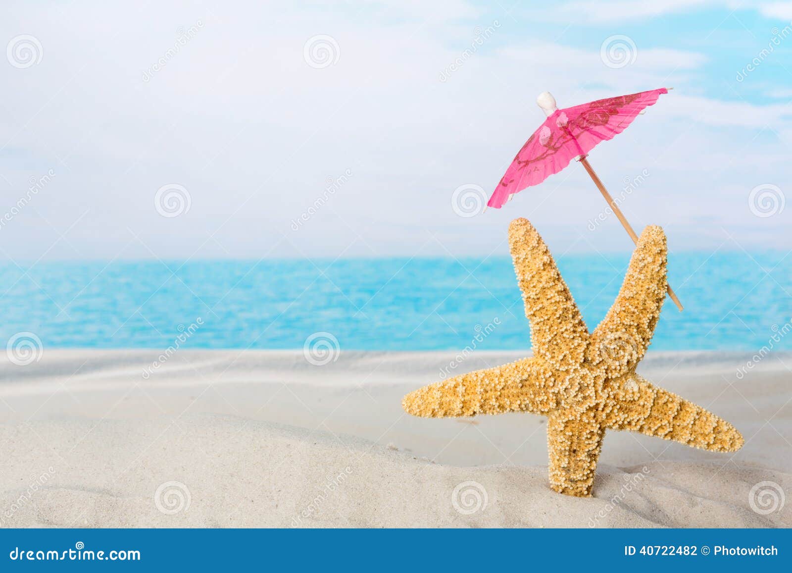 Starfish on Beach with Parasol Stock Photo - Image of shells, beach ...