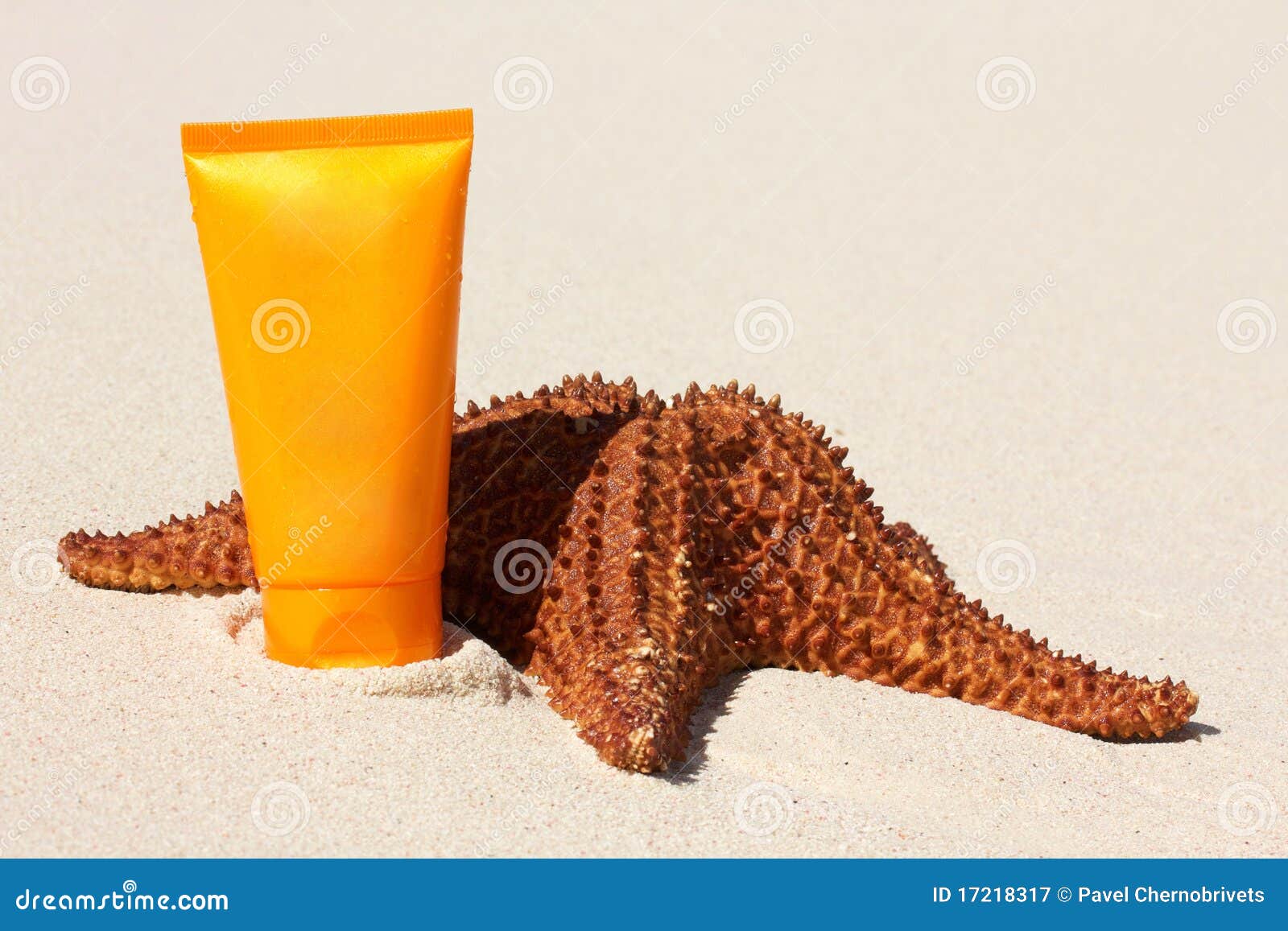 Starfish and Sun Protection Tube on Sand Stock Image - Image of beach ...