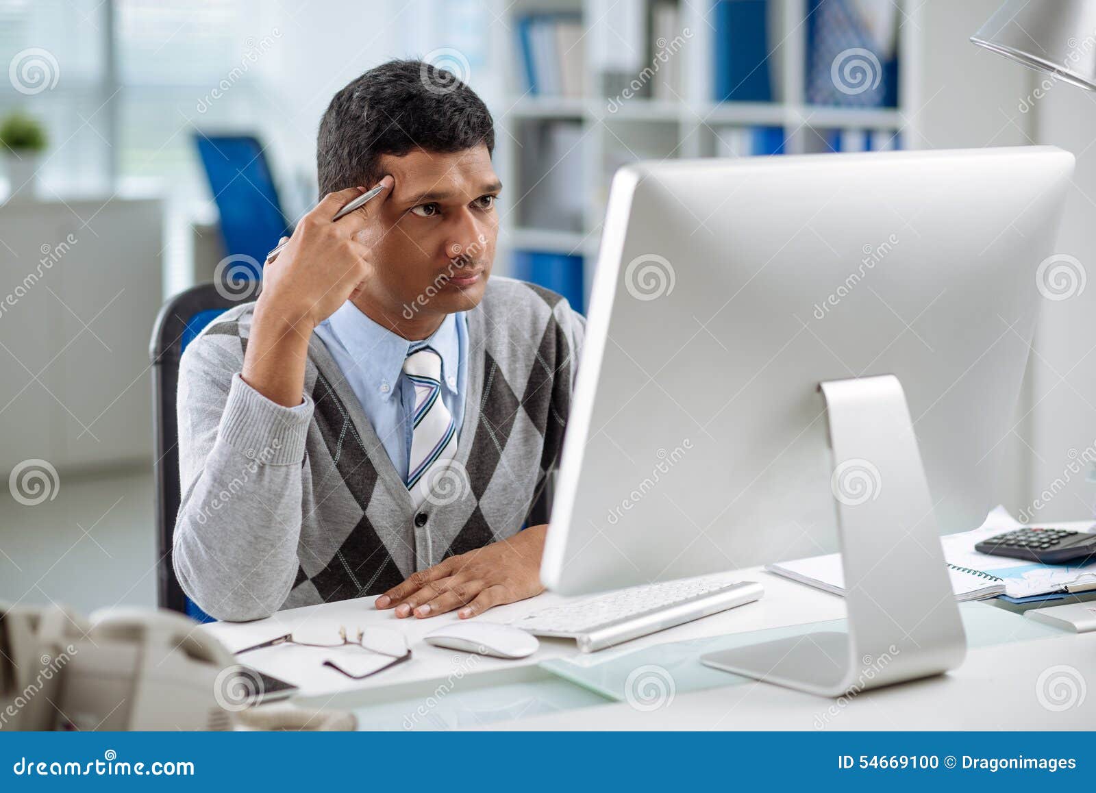 Staring at computer screen stock photo. Image of serious - 54669100