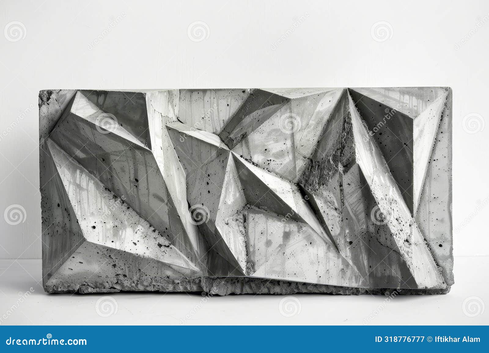 A Stark Black And White Sculpture Made From Chiseled Concrete With Sharp Angles And Edges ...