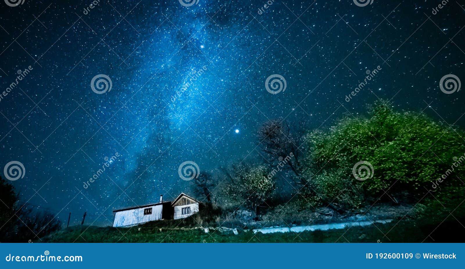 Starry Night Sky Over a Small House and Trees Stock Image - Image of ...
