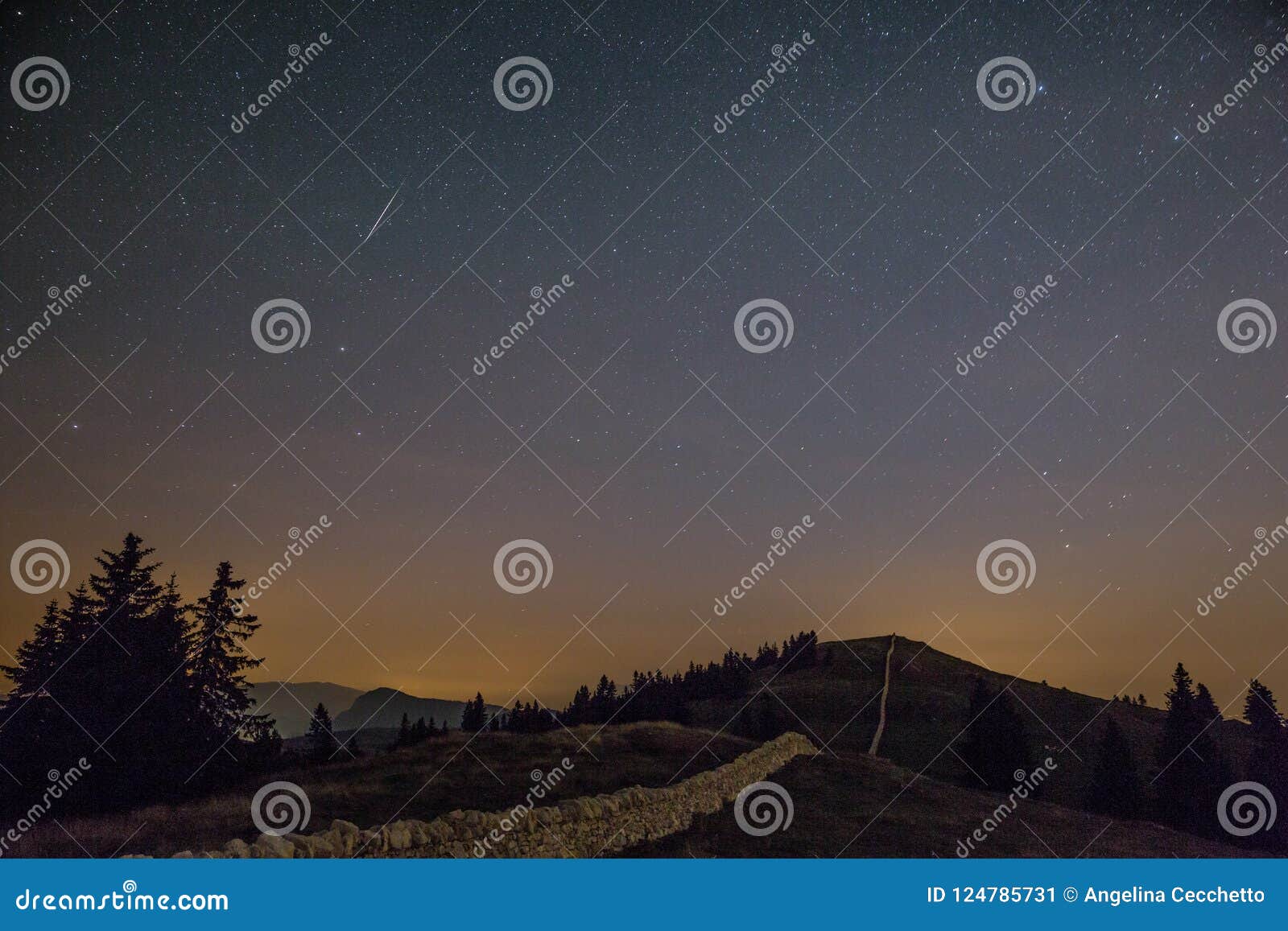 Starry Night Sky and Shooting Stars Over Mountains Stock Image - Image ...