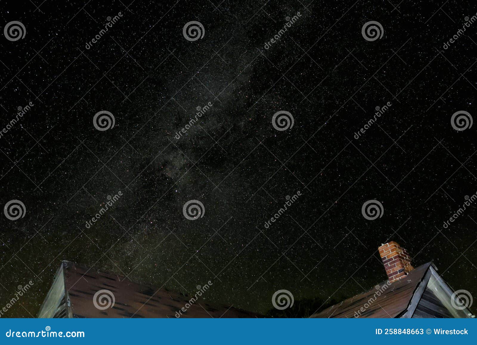 Starry Sky View at Night Time Above House Rooftops Perfect for ...