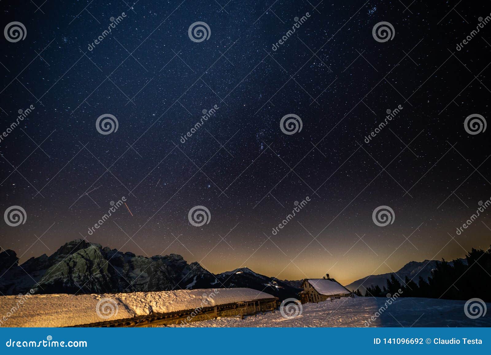 Stars over snowy mountains stock photo. Image of field - 141096692