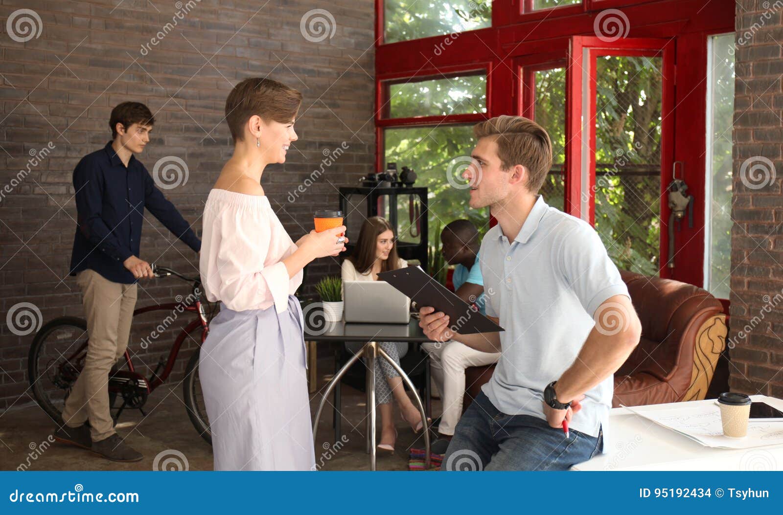 Start of a Busy Day at Work in Trendy Office with Coworkers. Stock ...