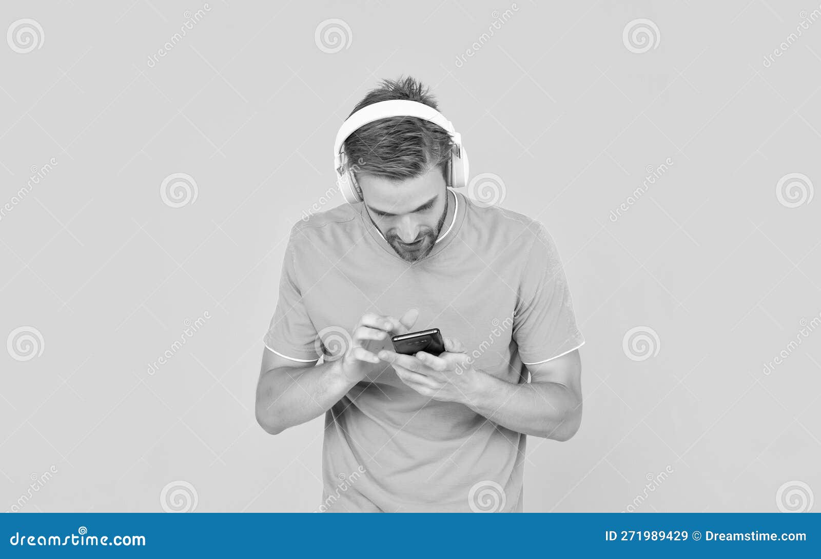 Start Chatting Now. Guy Listening To Music Chatting on Smartphone ...